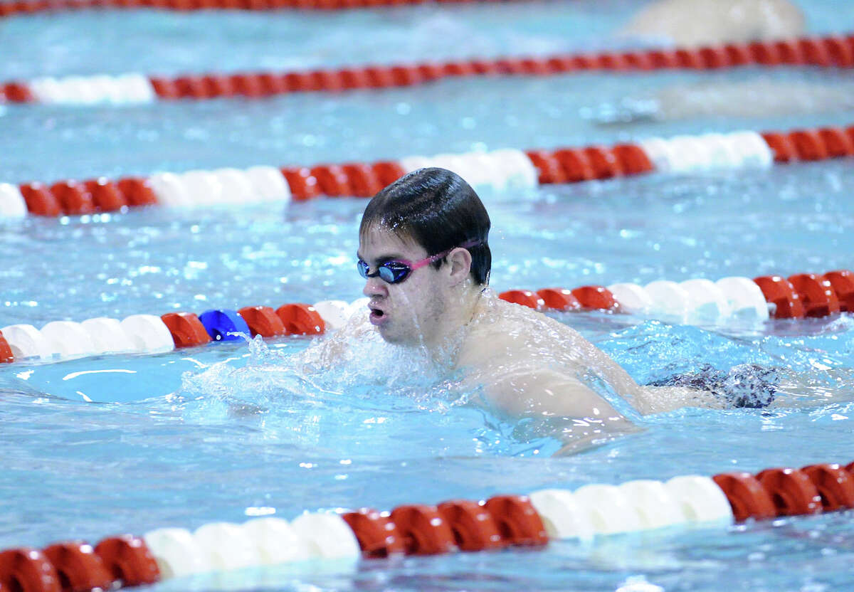 Greenwich swimmers cruise past Staples
