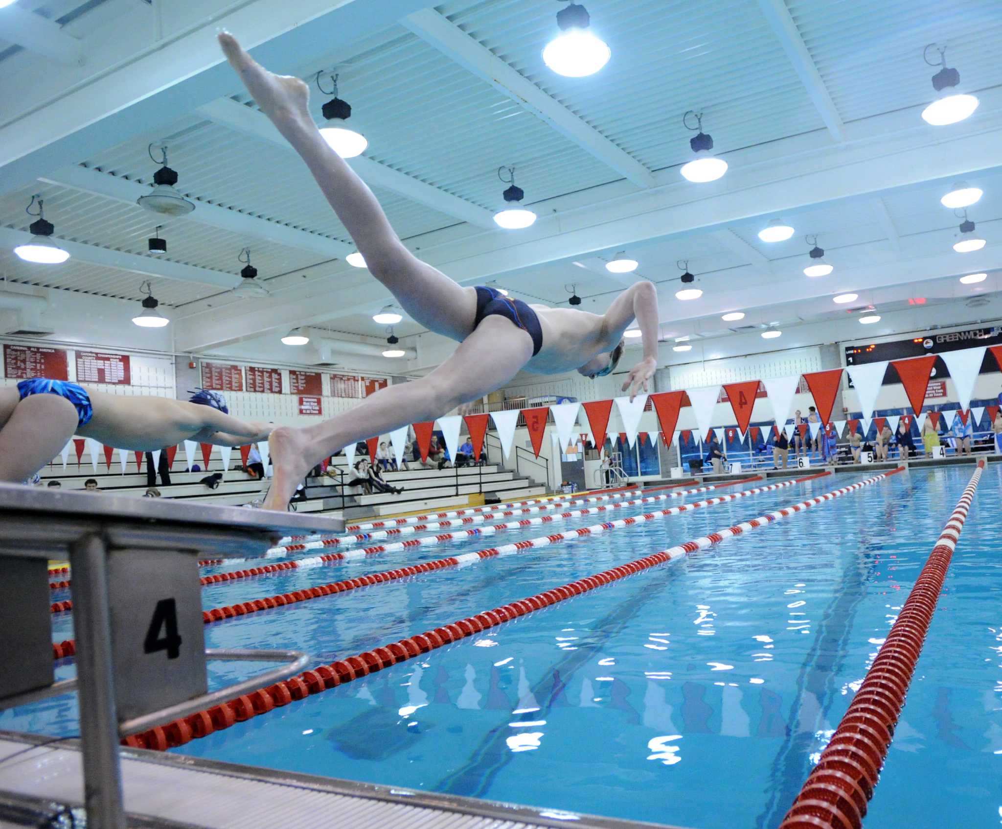 Greenwich boys swimming cruises past Staples
