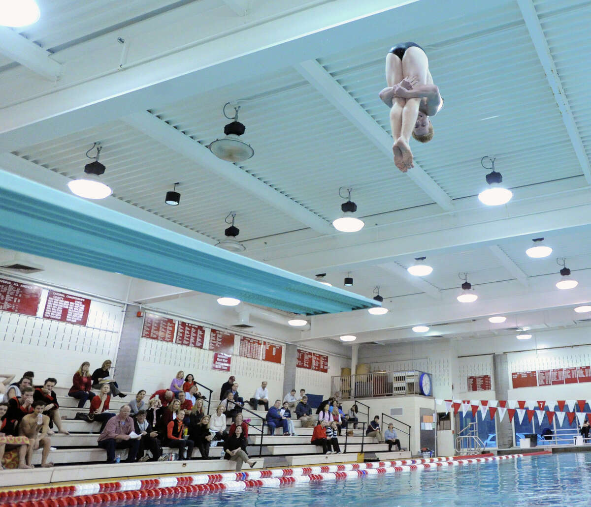 Greenwich boys swimming cruises past Staples