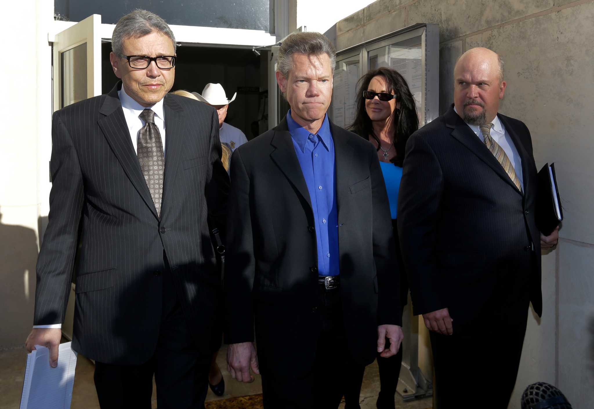 Celebrities: Travis pleads guilty to DWI