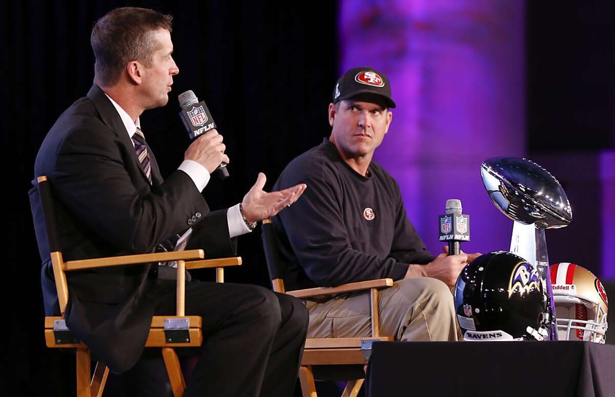 Harbaugh brothers stand apart together