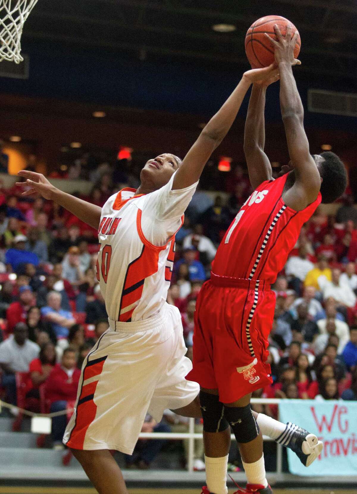 High school basketball: Bush 55, Travis 50