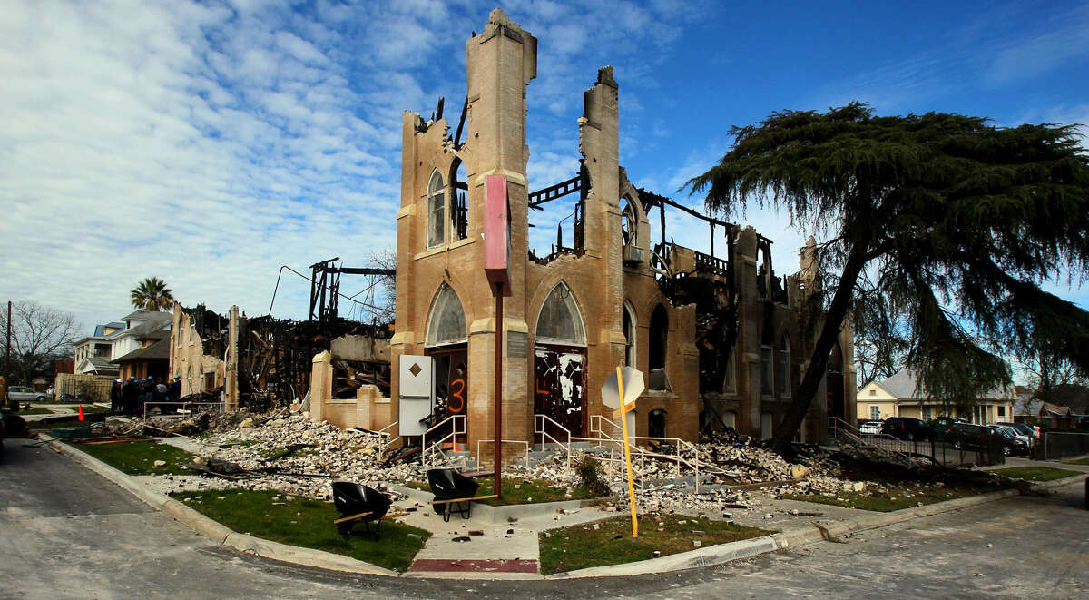 Burnt church weighs move
