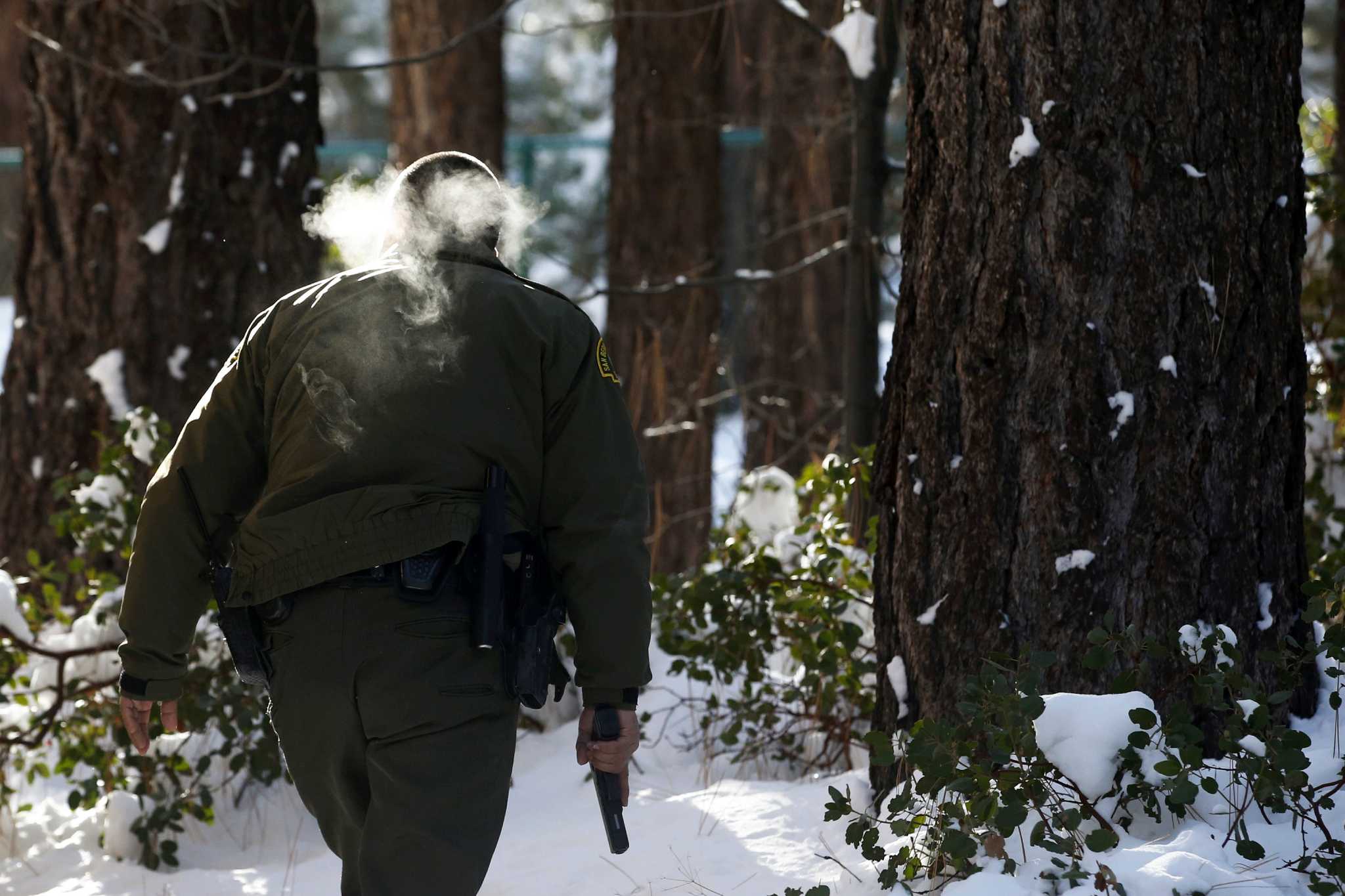 Search for fugitive ex-cop sets region on edge