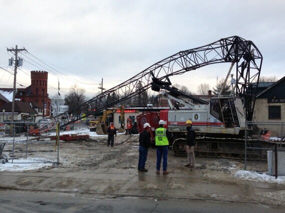 Crane collapses at construction site