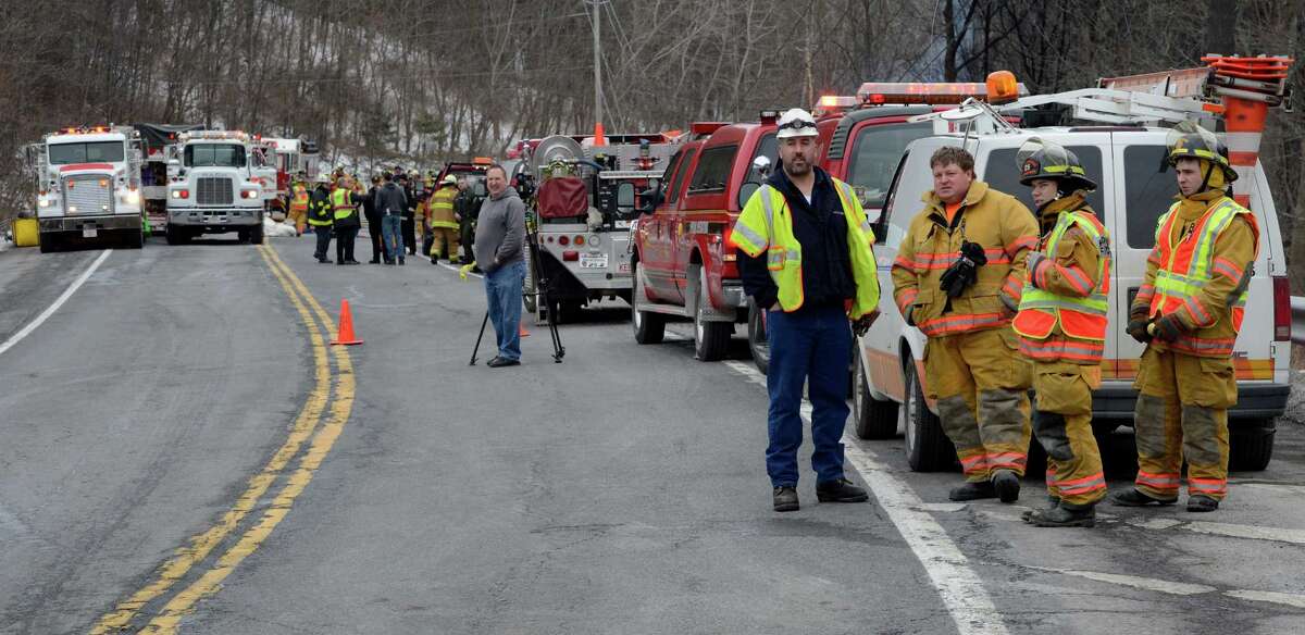 Gas truck ignites after crash; driver burned