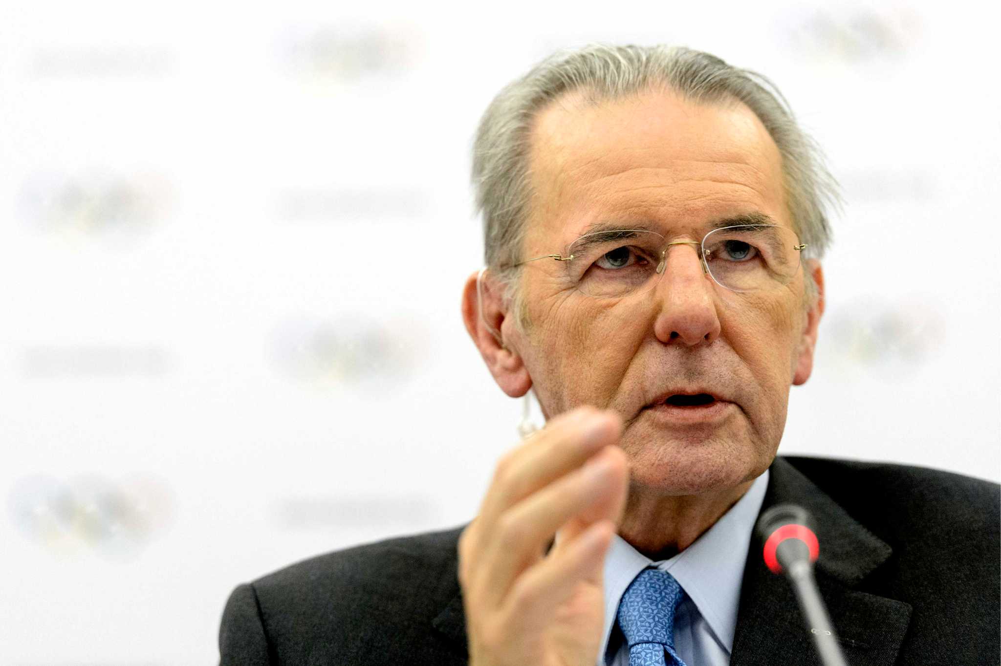 IOC's Rogge agrees to meet with wrestling leader