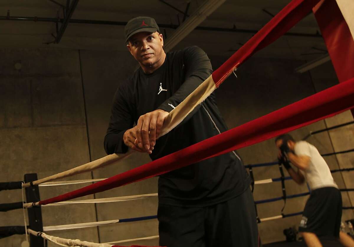 Boxing trainer teaches to not get hurt