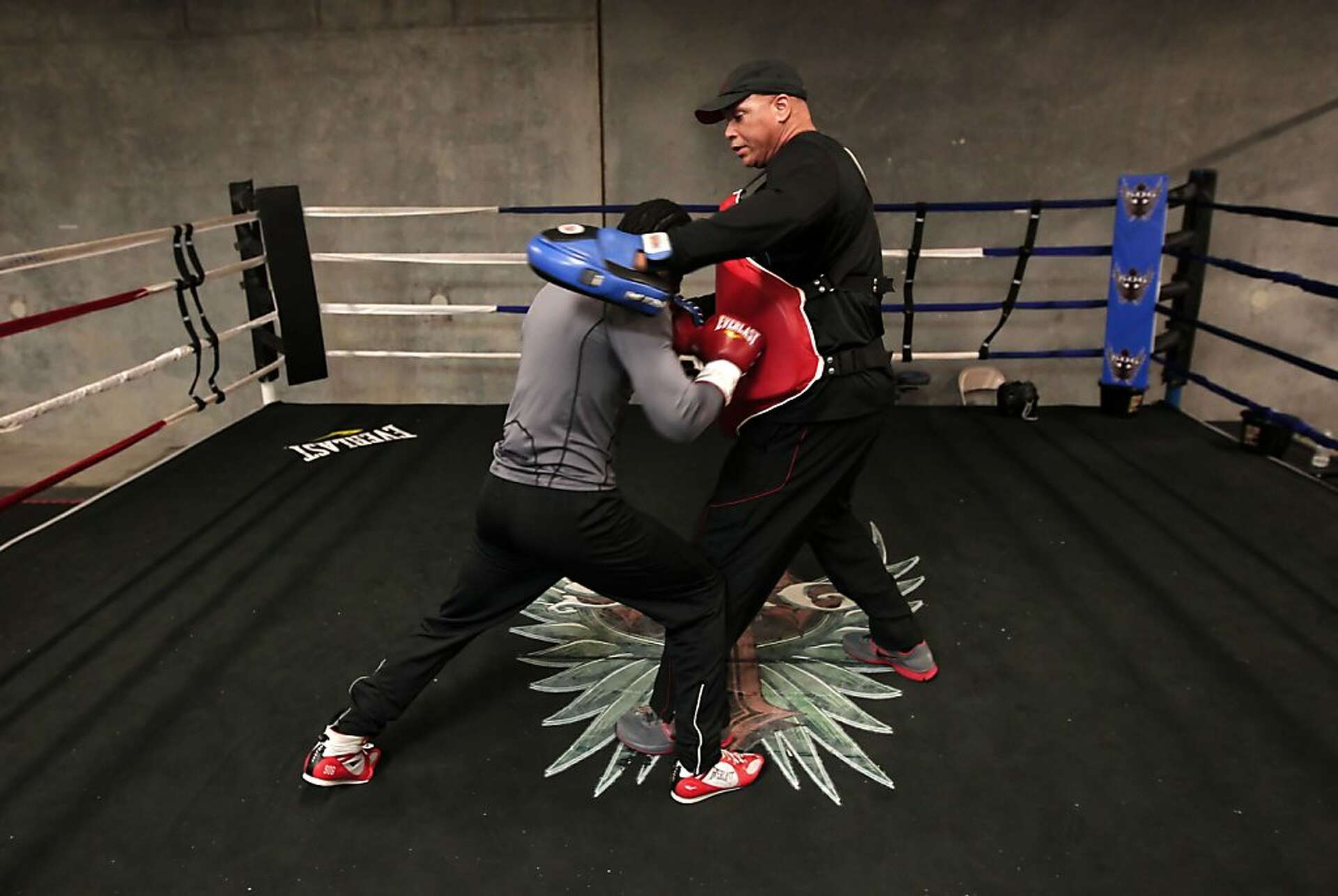 Boxing trainer teaches to not get hurt