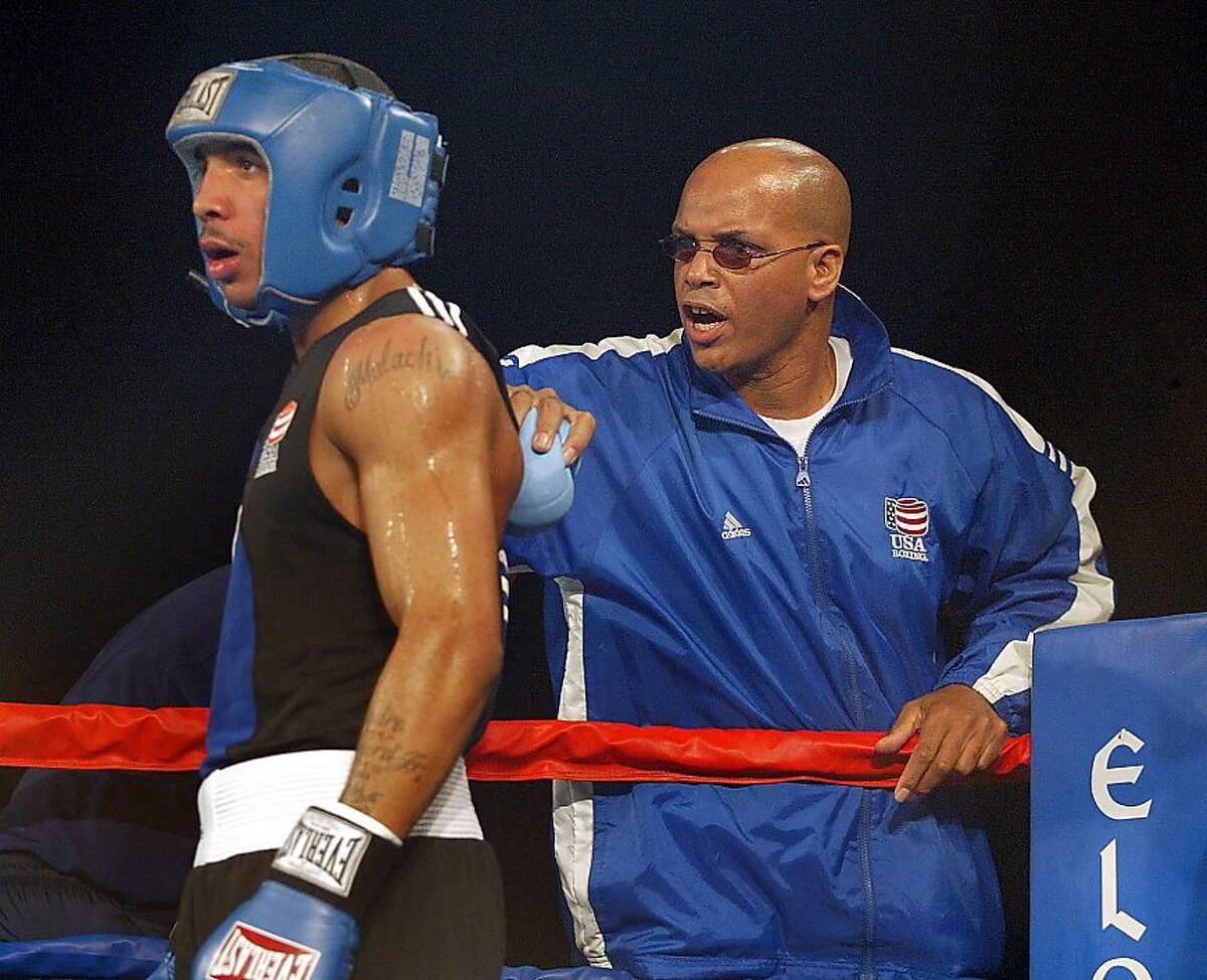 Boxing trainer teaches to not get hurt