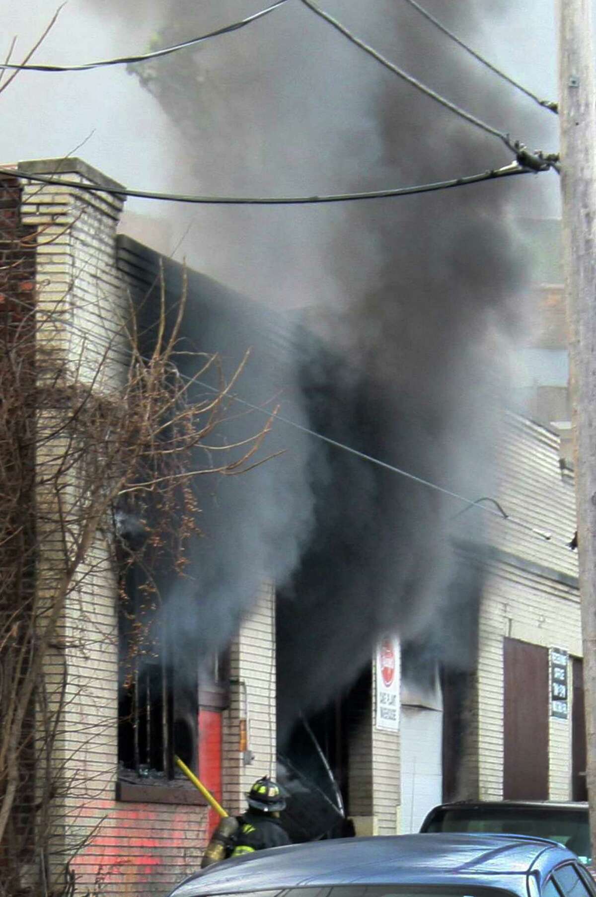 Auto garage fire a smoky scene
