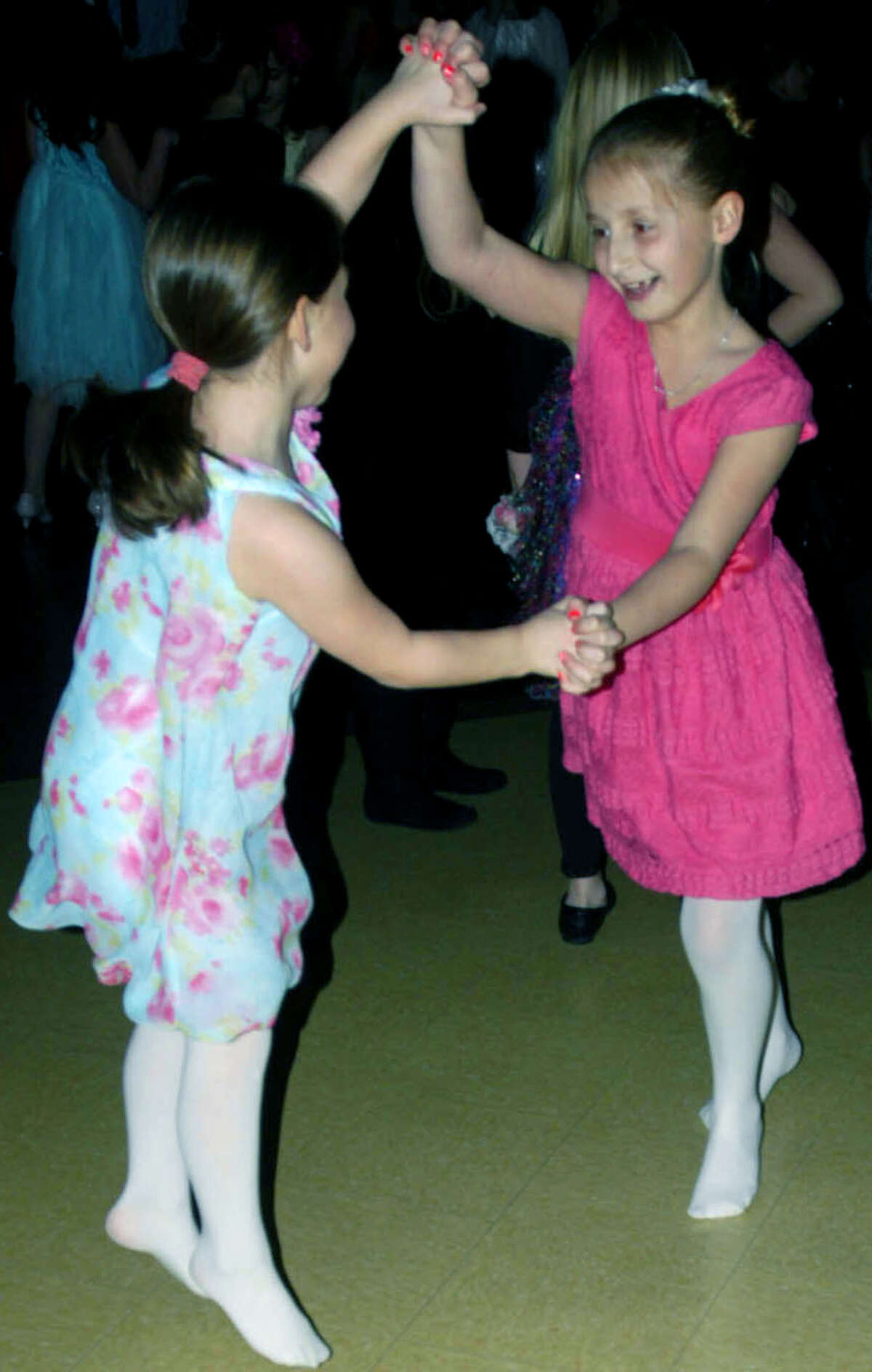 Girls Scouts and their guys enjoy Sweetheart Dance