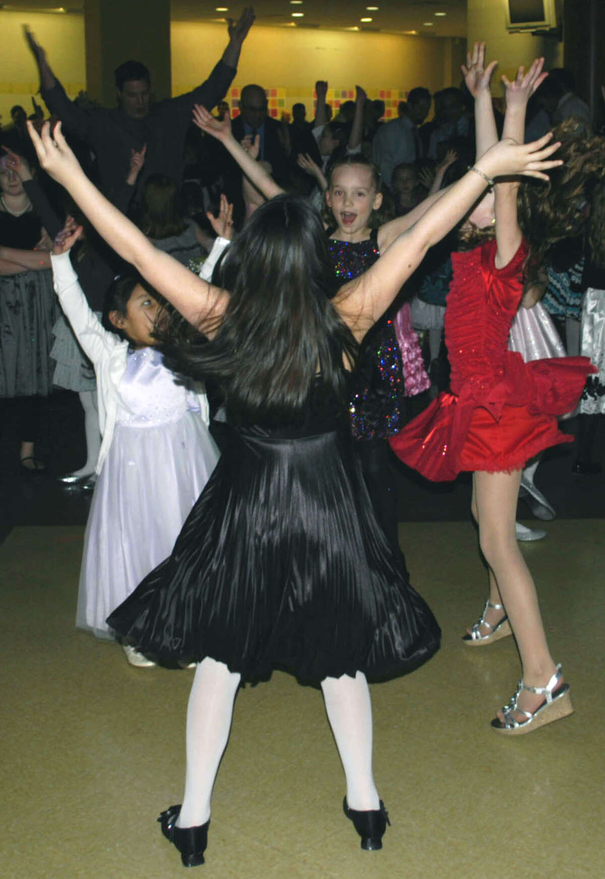 Girls Scouts and their guys enjoy Sweetheart Dance