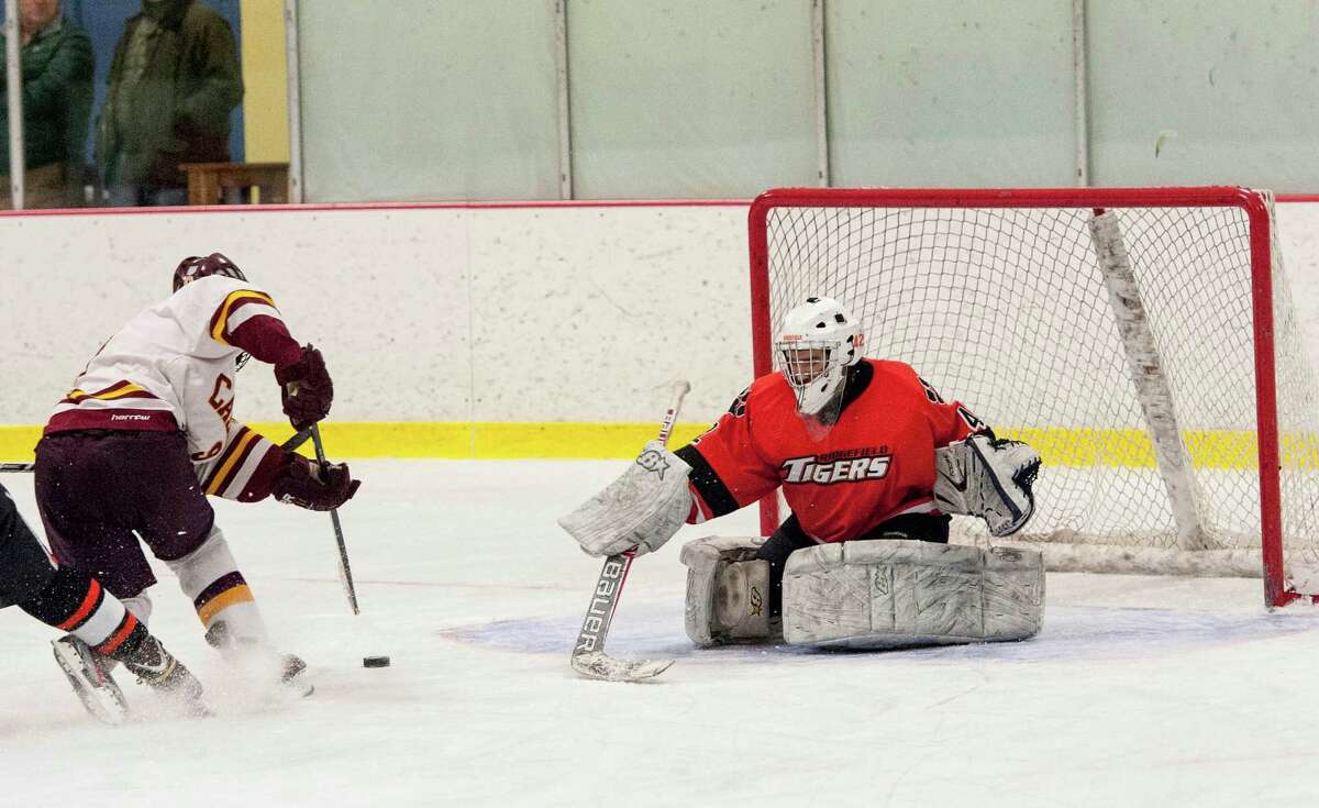 Ridgefield repeats as FCIAC boys hockey champions