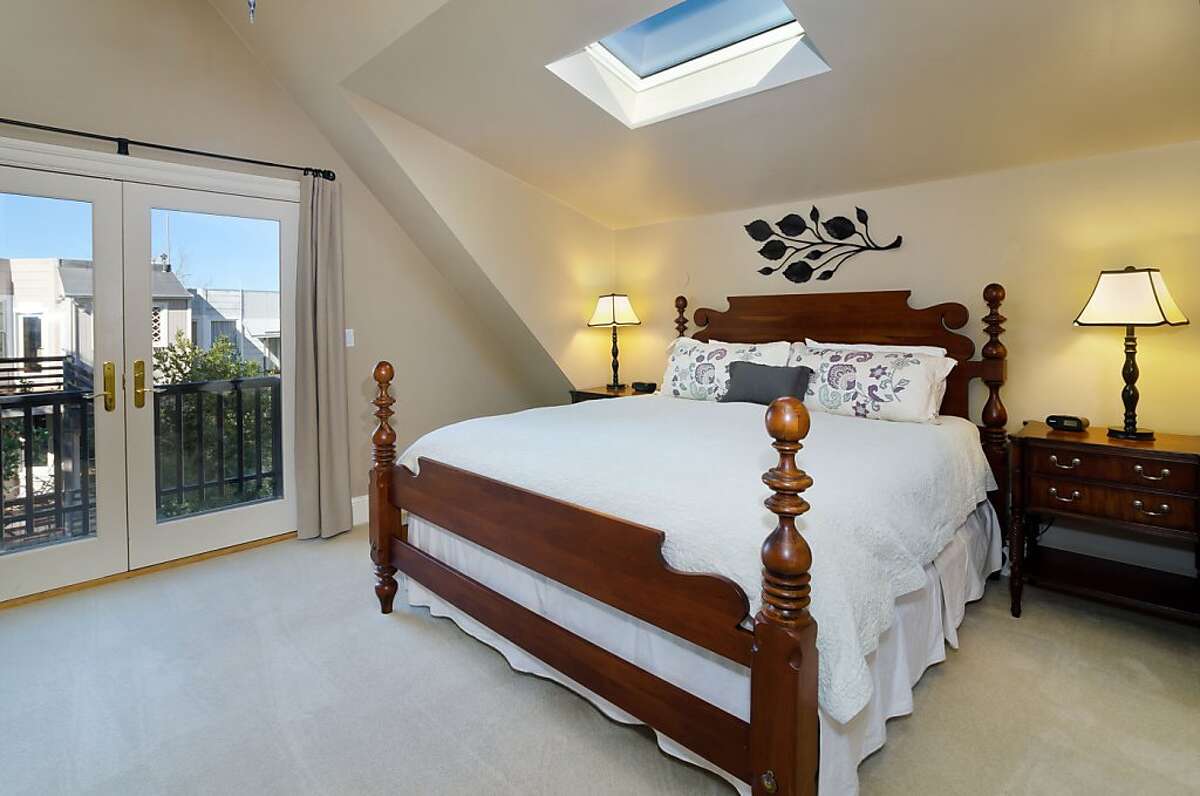 Master suite overlooks garden of 3-bedroom home