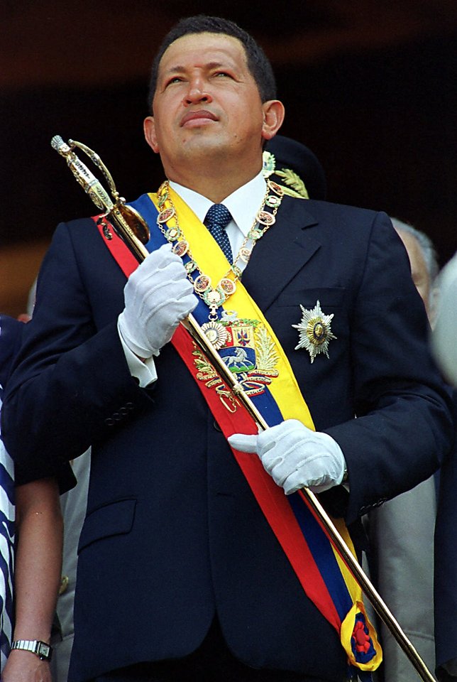The pope and Hugo Chavez contrasted