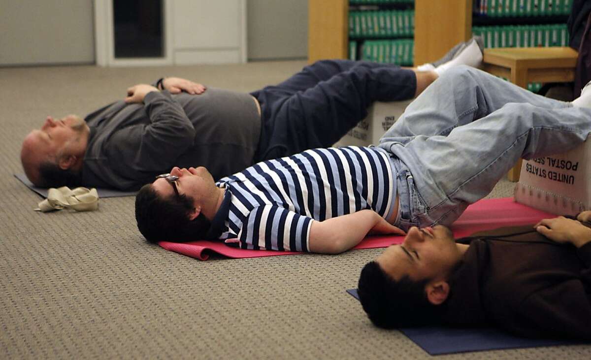 Visually impaired enjoy yoga in library