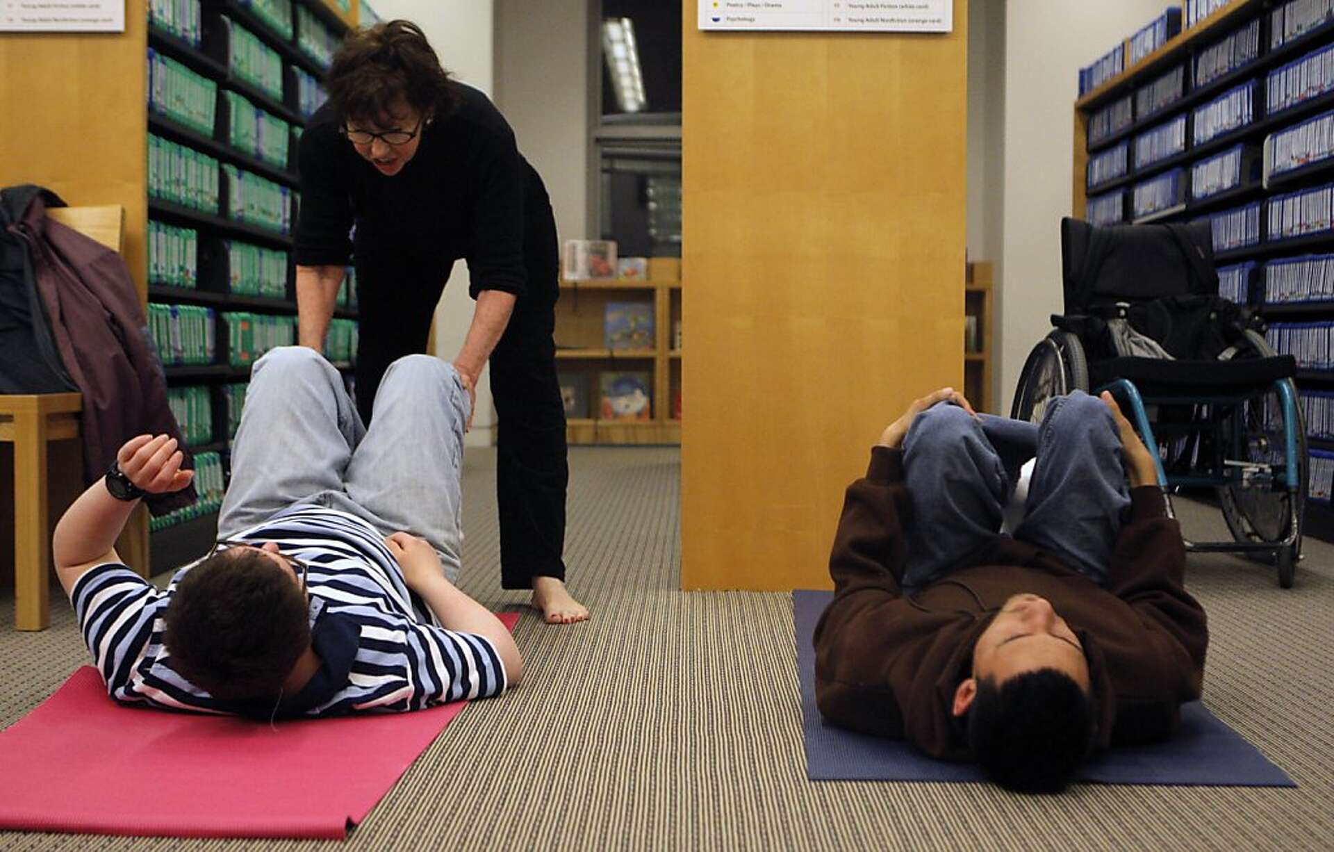 Visually impaired enjoy yoga in library