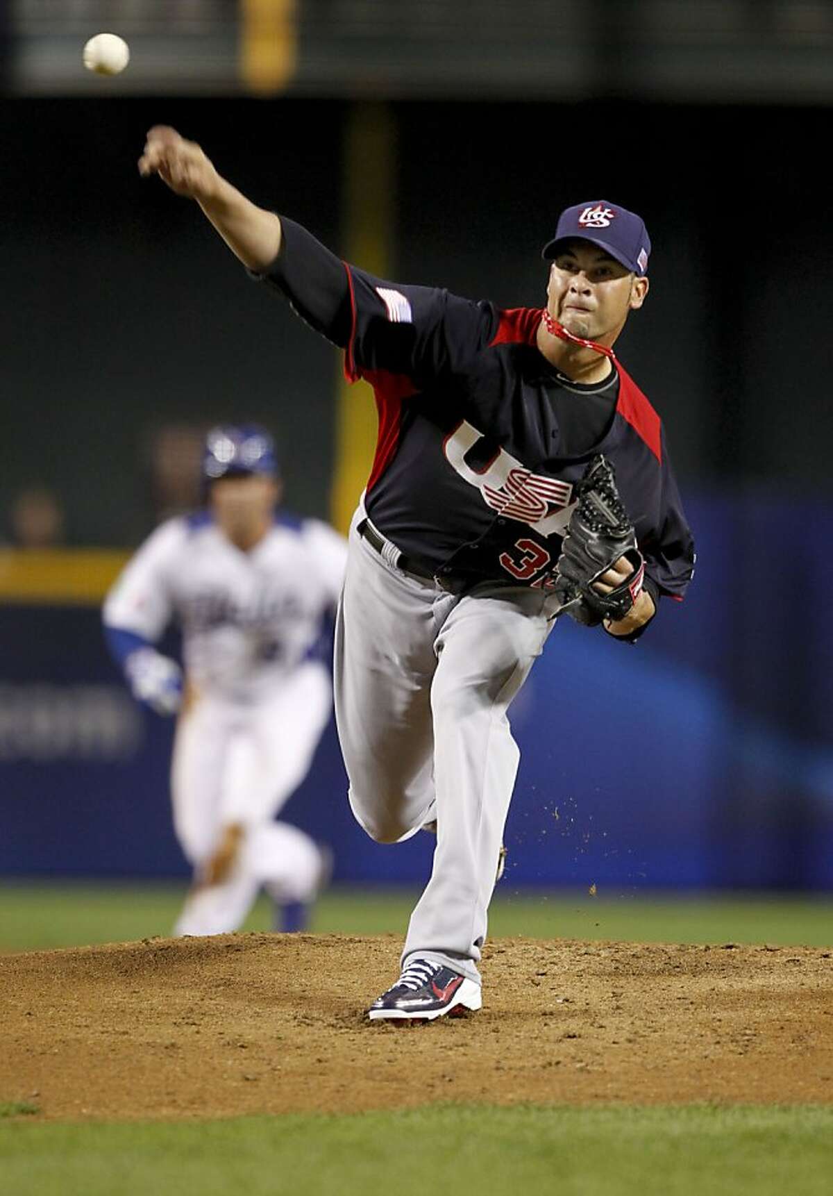 Vogelsong helps pitch U.S. over Italy