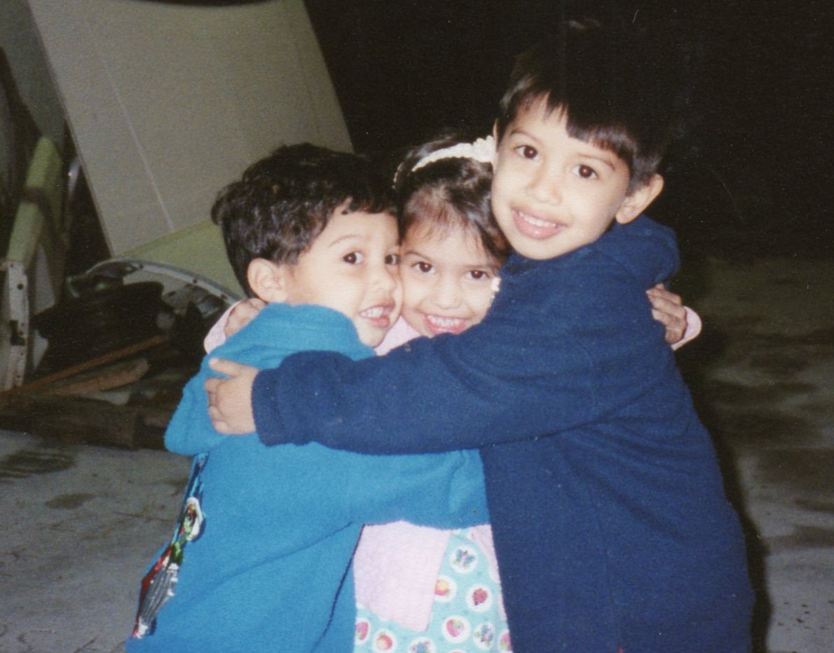 Then & Now: Hugging siblings