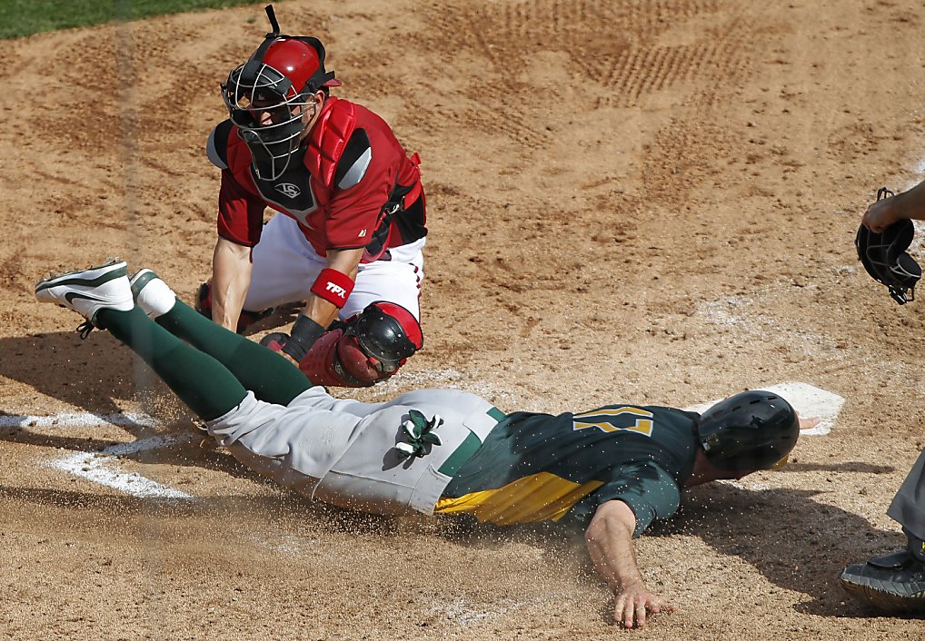Henderson helps A's slide like Sully
