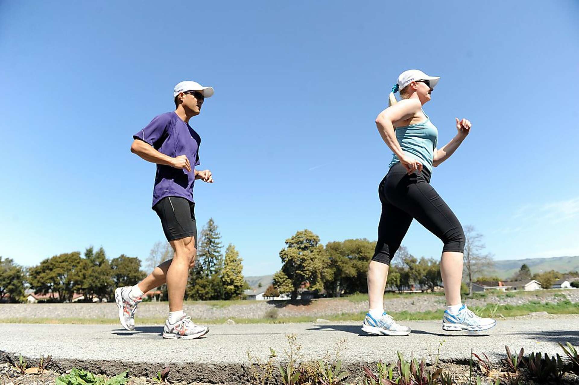 Walkers making a run at marathons