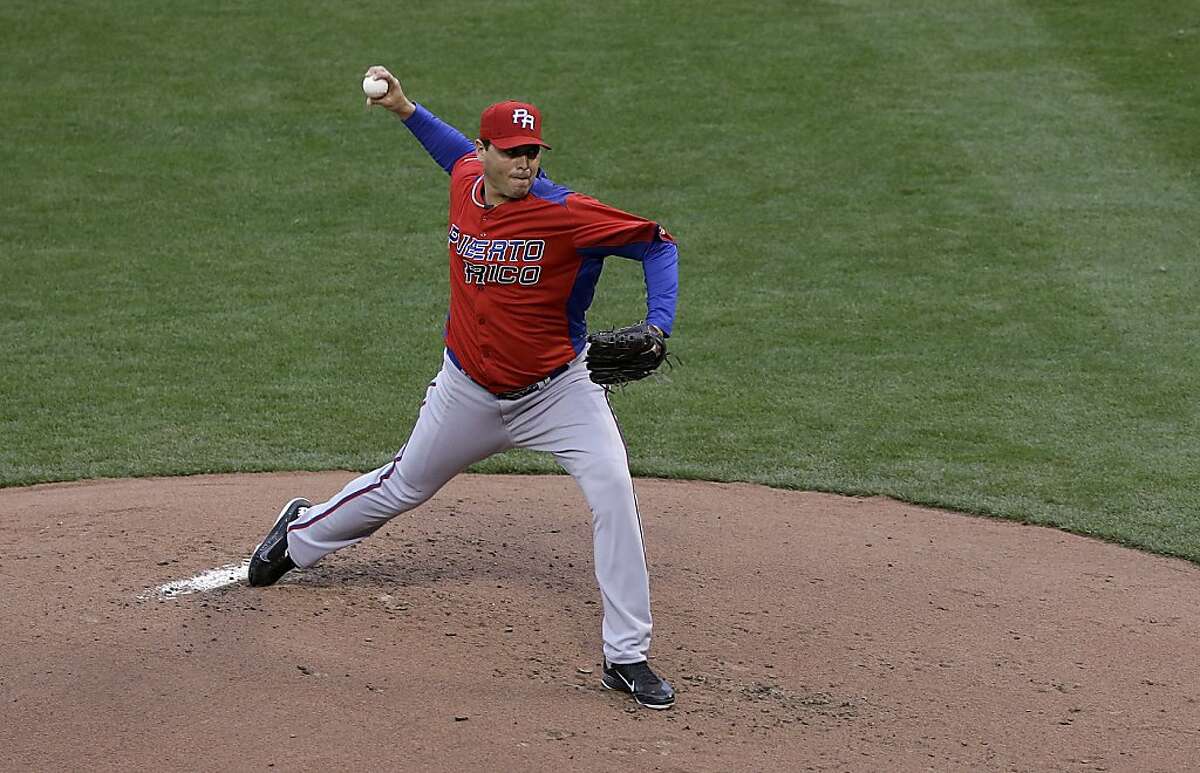 Dominicans top Puerto Rico 3-0, win WBC