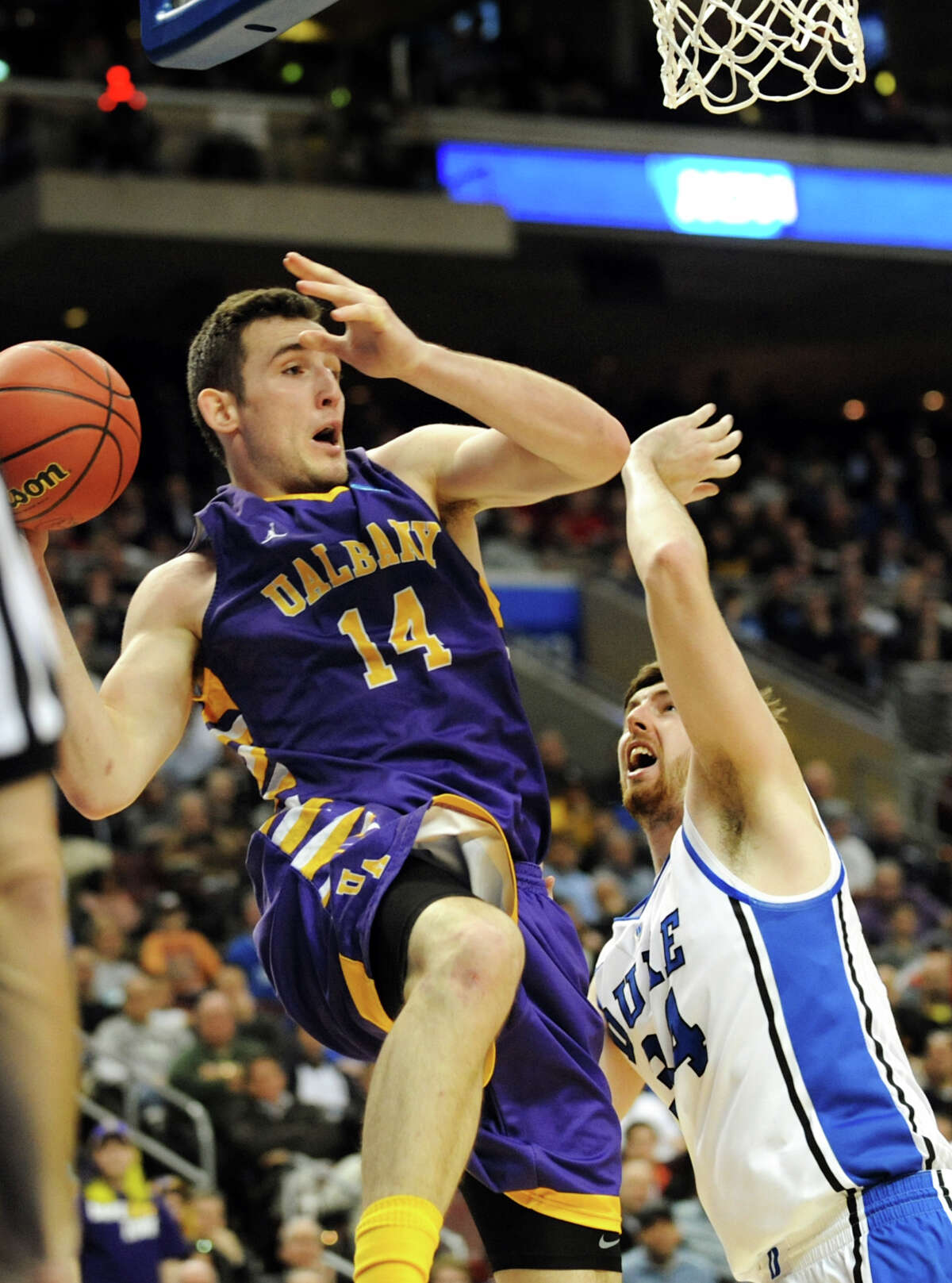 Fans hold heads high in defeat of UAlbany