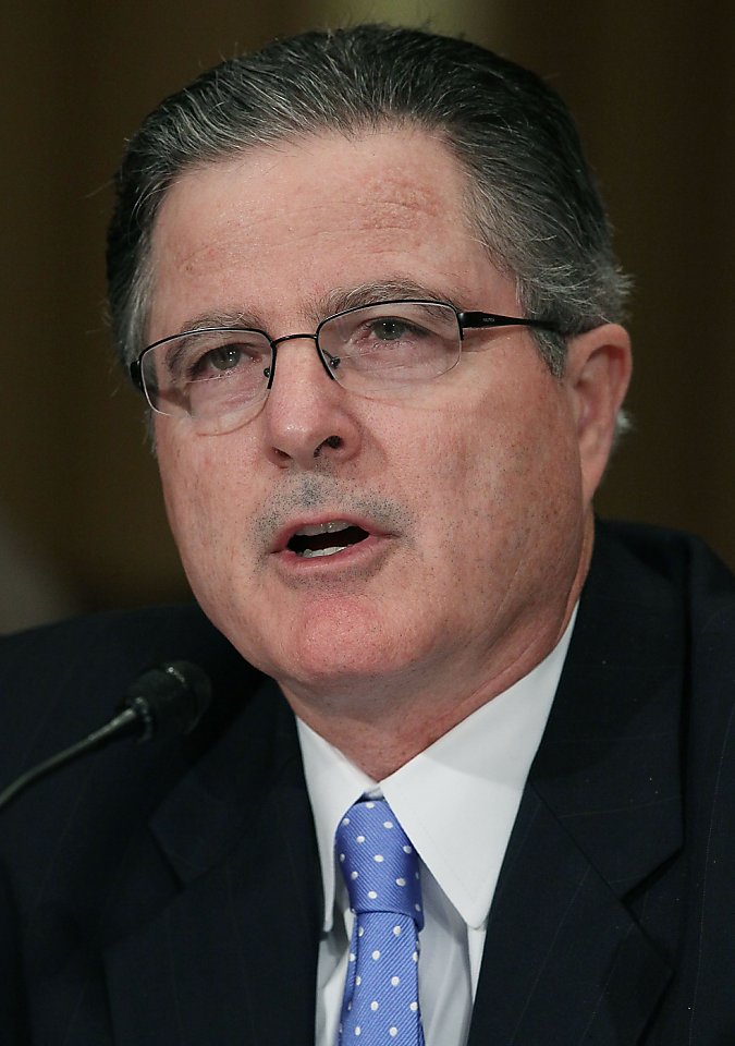 Chevron cuts bonus for CEO, other execs
