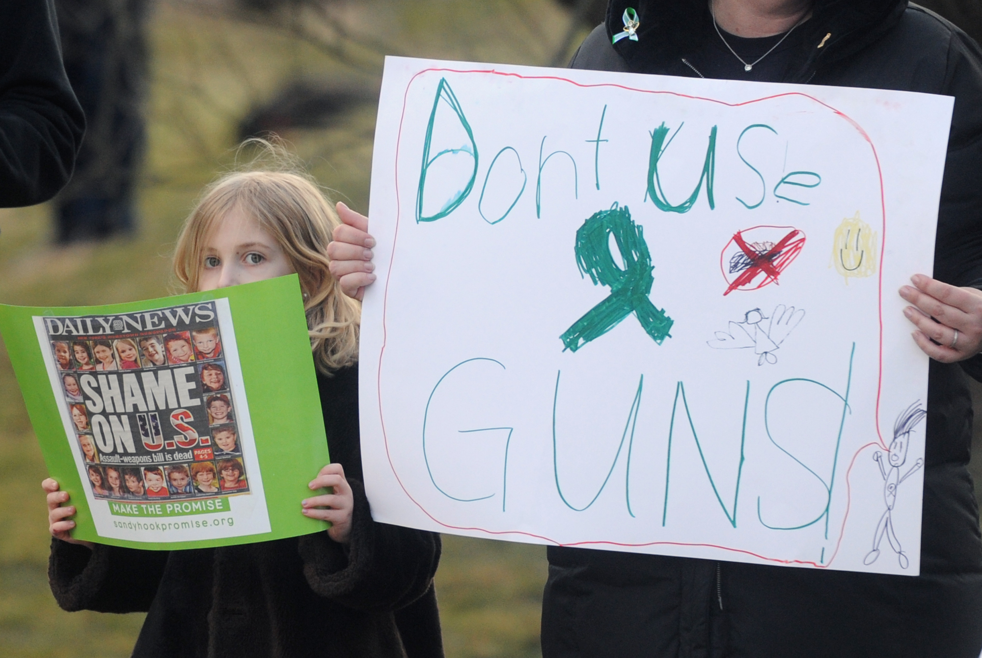 Rally Draws Gun Advocates Reformers
