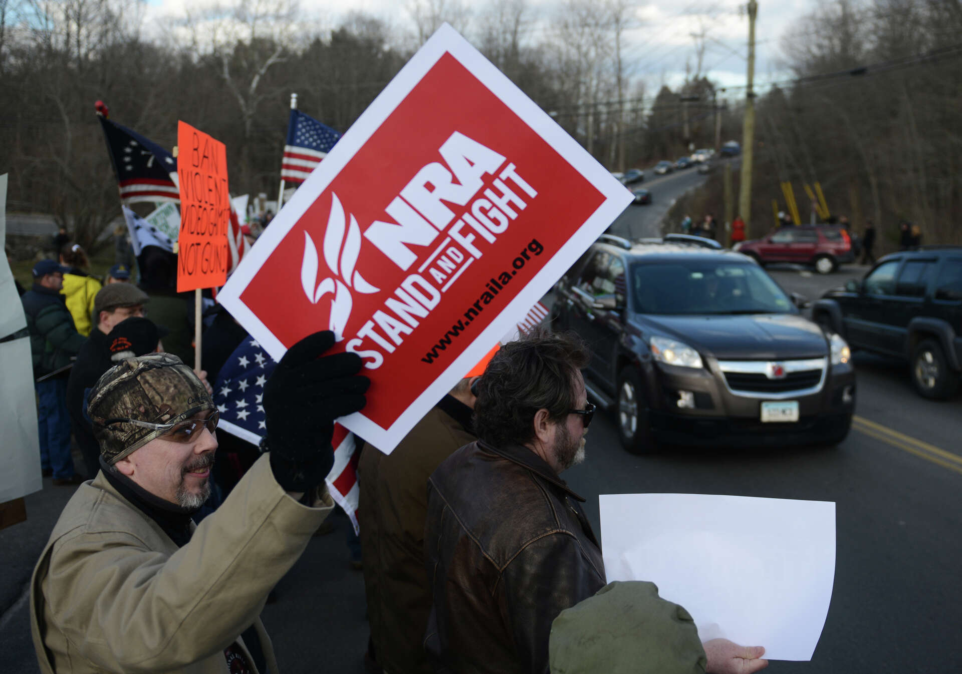 Rally draws gun advocates, reformers