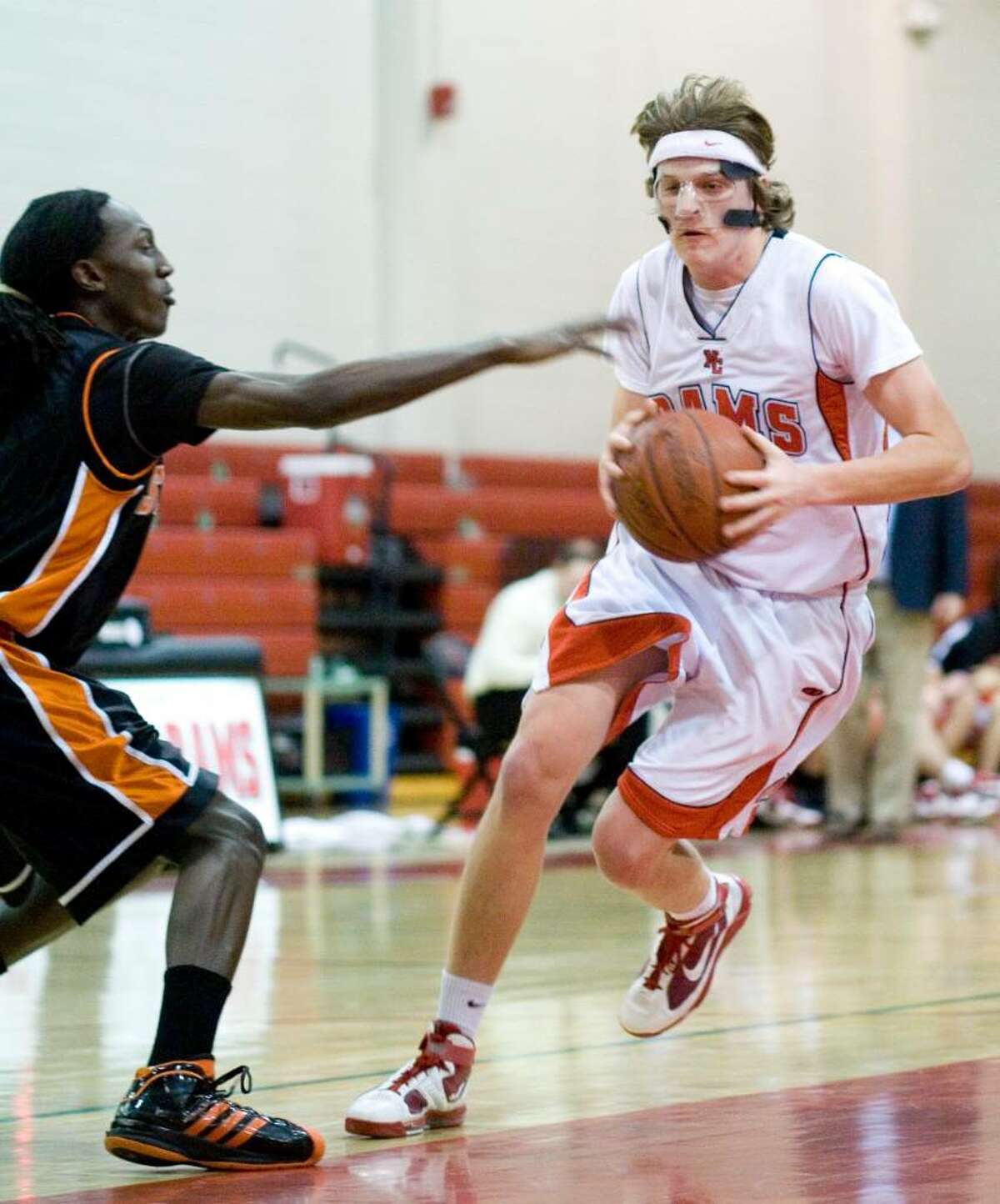 Stamford boys basketball puts away New Canaan with late spurt