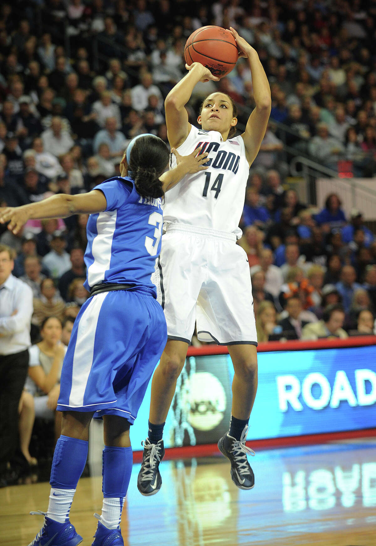 Hartley thrives in new role off UConn bench