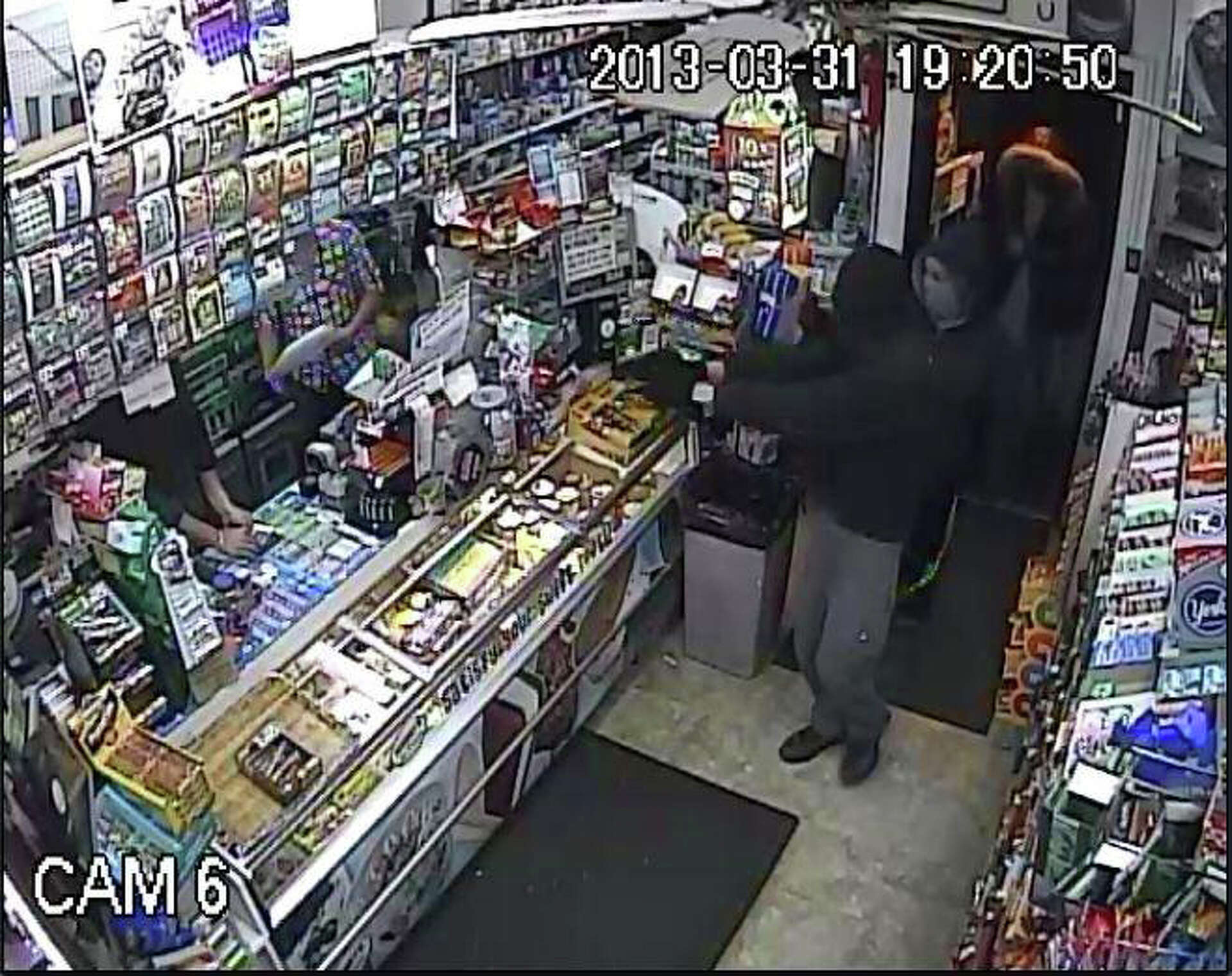 Store video shows masked robbers