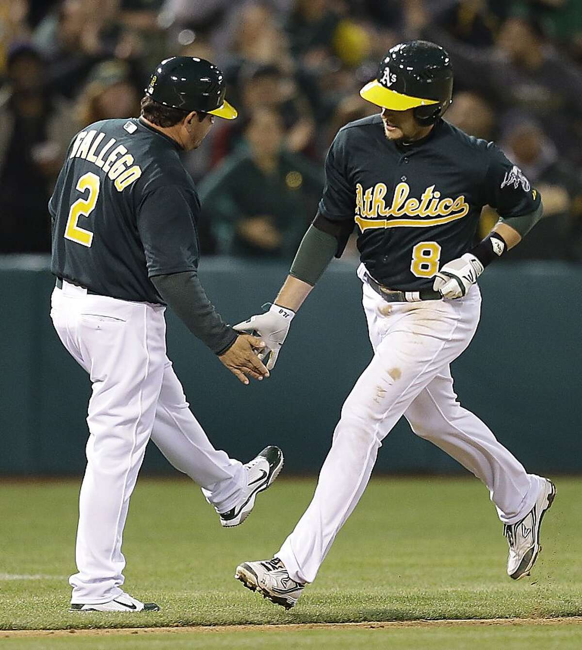 A's break out bats to defeat Mariners