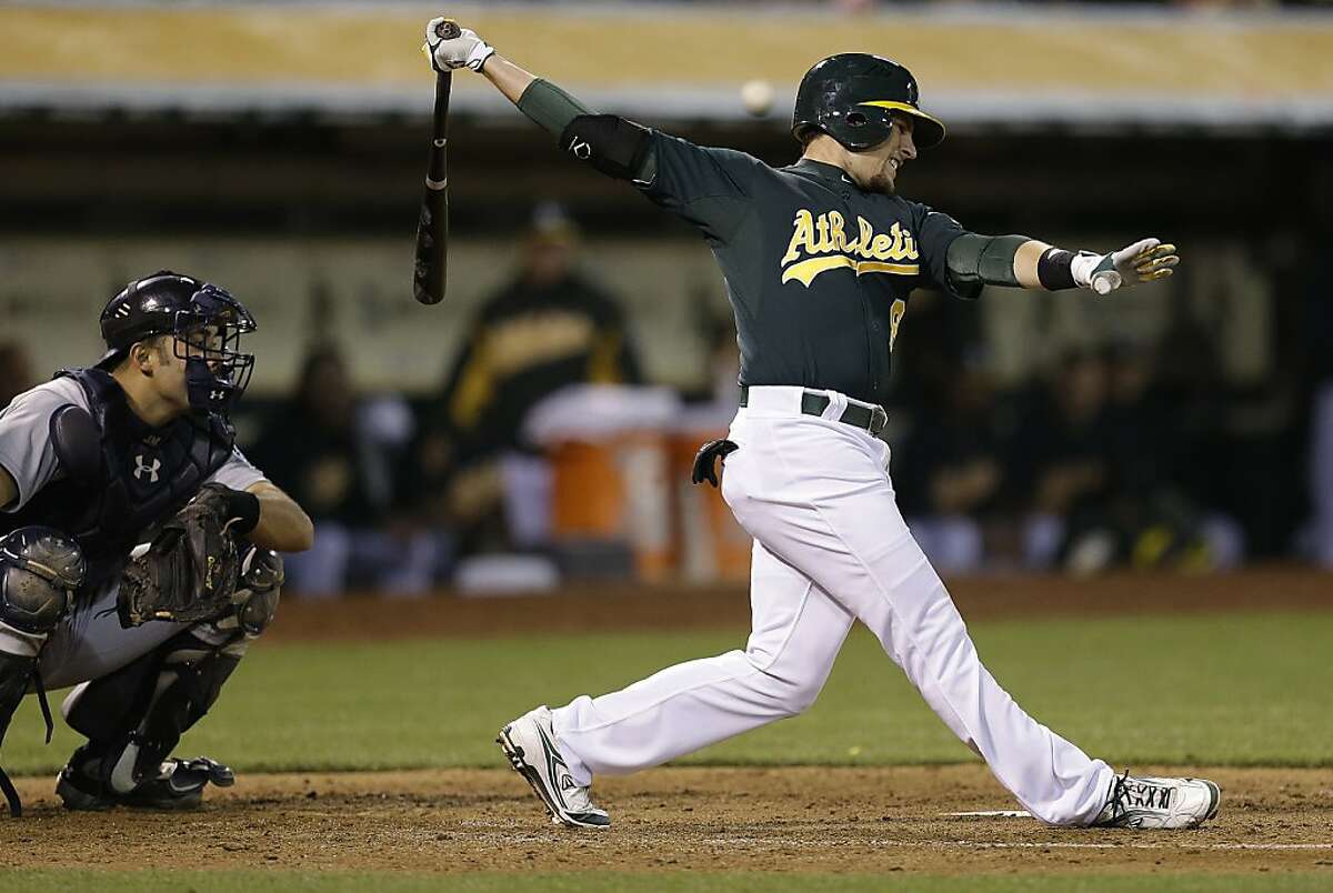 A's break out bats to defeat Mariners