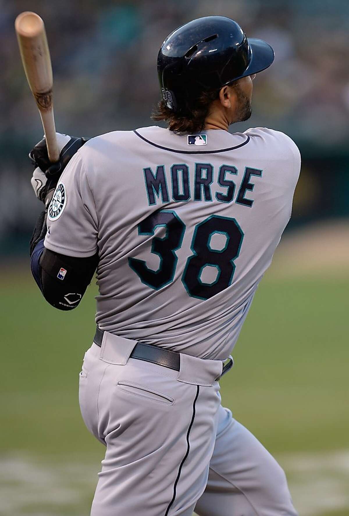 A's break out bats to defeat Mariners