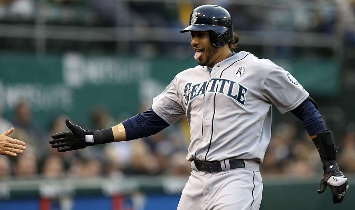 A's break out bats to defeat Mariners