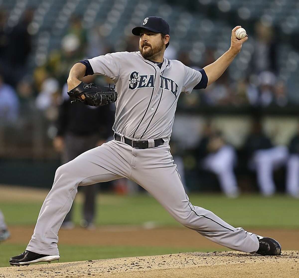 A's break out bats to defeat Mariners