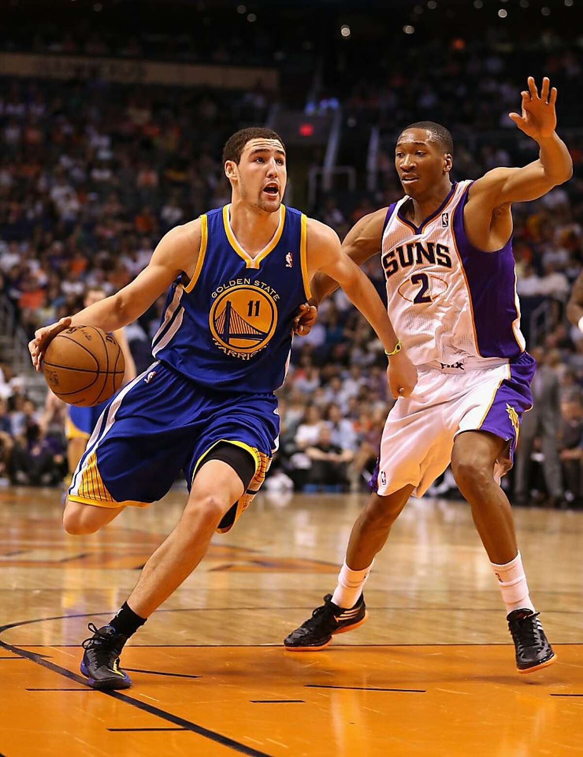 Warriors come back to beat Suns, 111-107