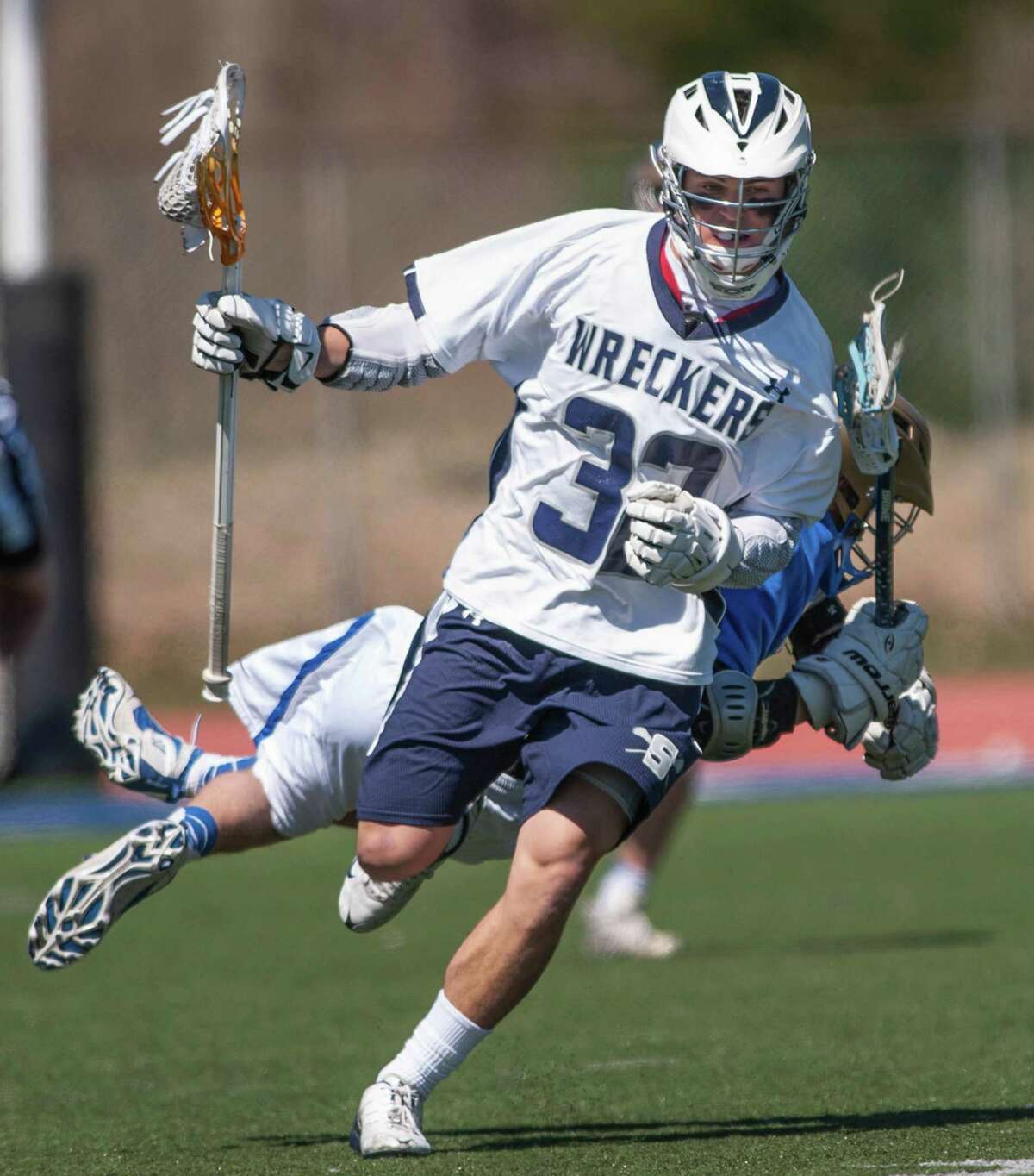 Staples boys lacrosse rolls past Newtown