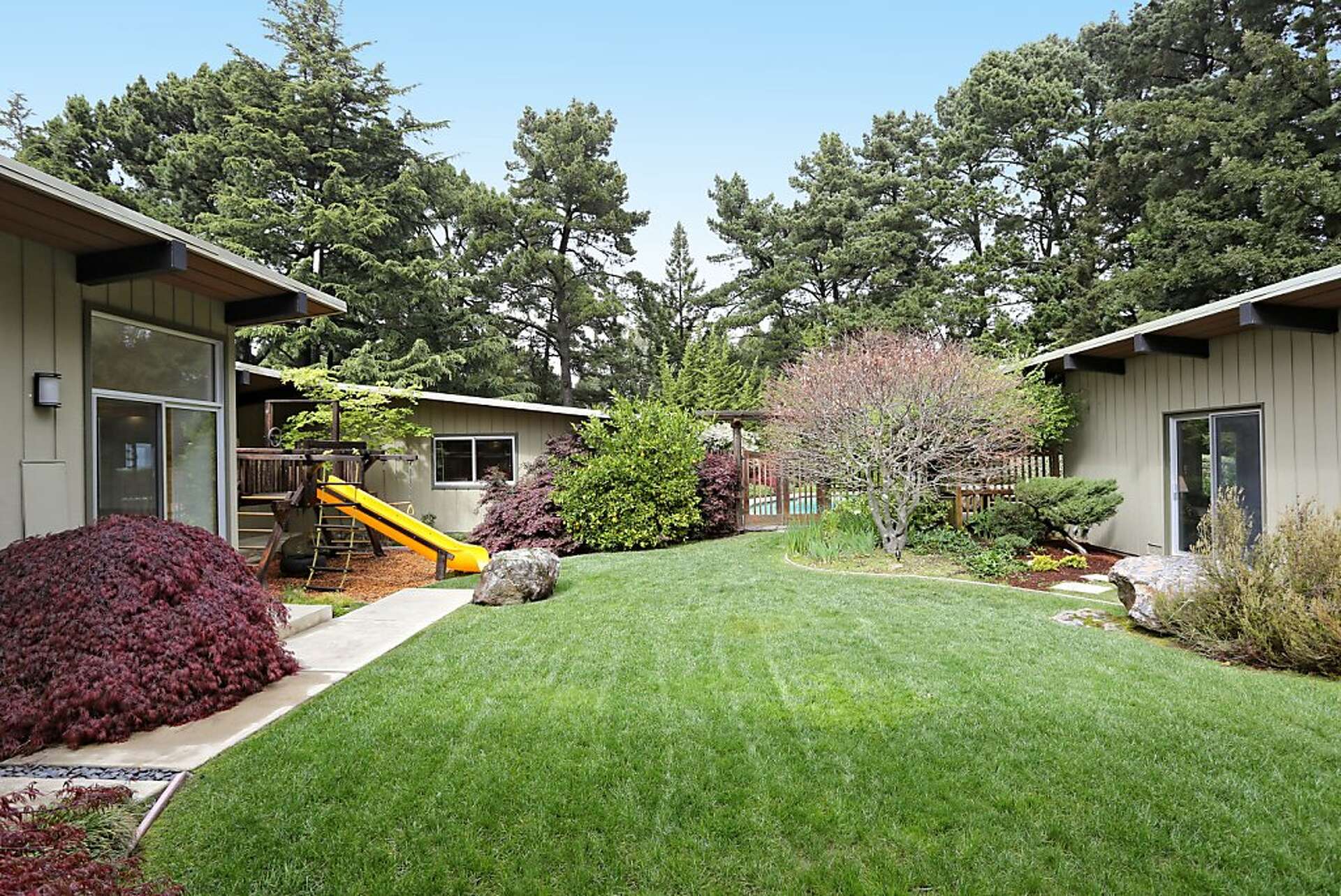 Oakland home features pond, pool, views