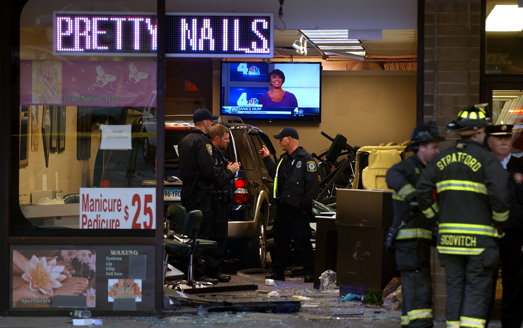 SUV crashes into nail salon, 8 hospitalized