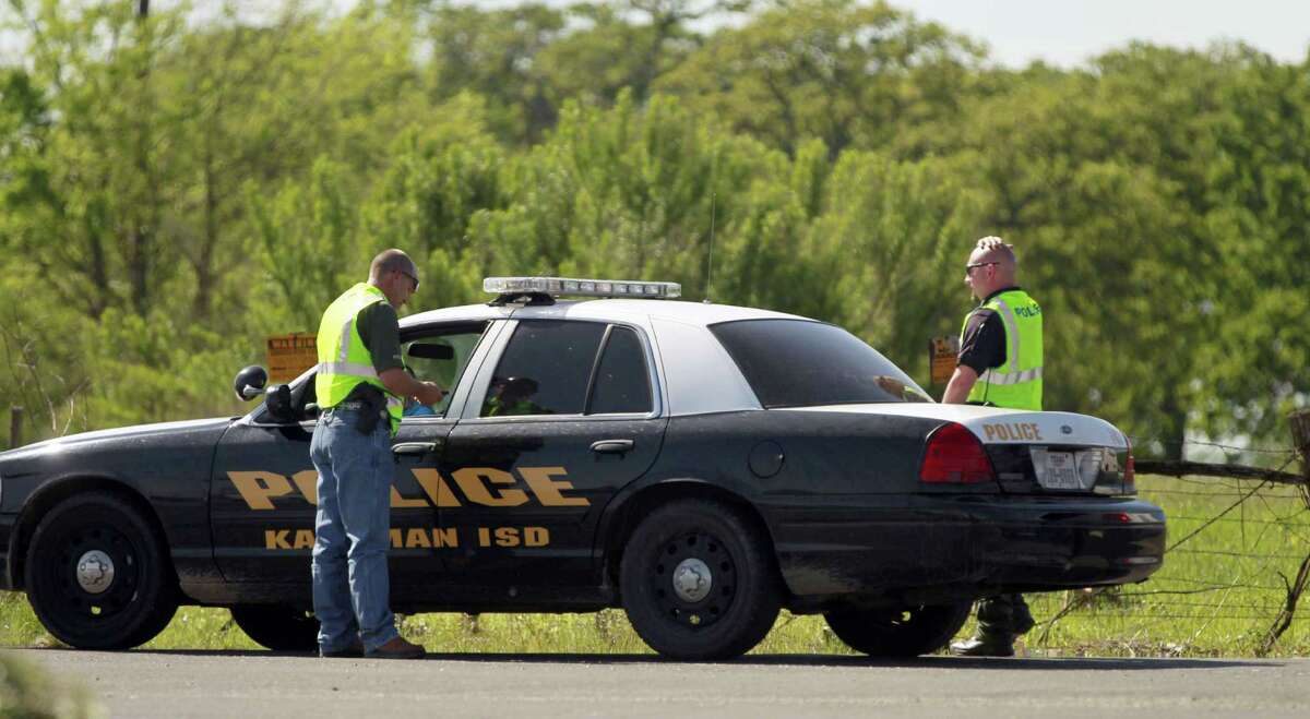 After home searched in DA probe, man charged with threat