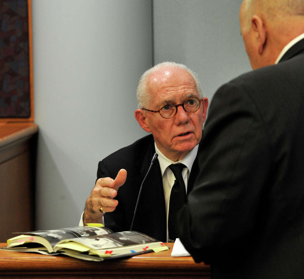 Private eye says Sherman was distracted during trial