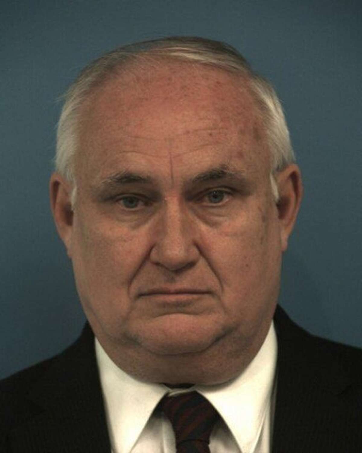 Former prosecutor charged in wrongful conviction case