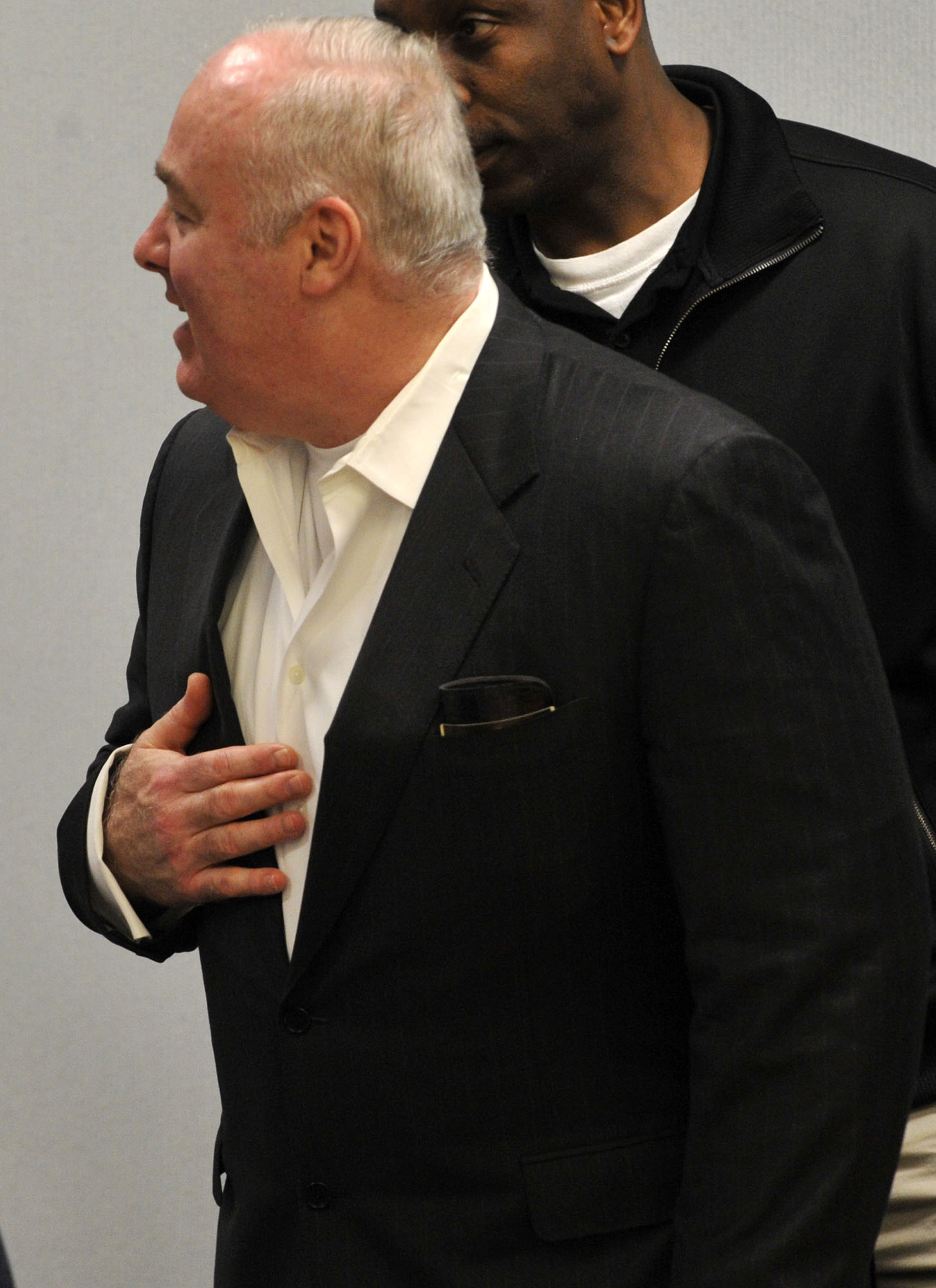 Private eye says Sherman was distracted during trial