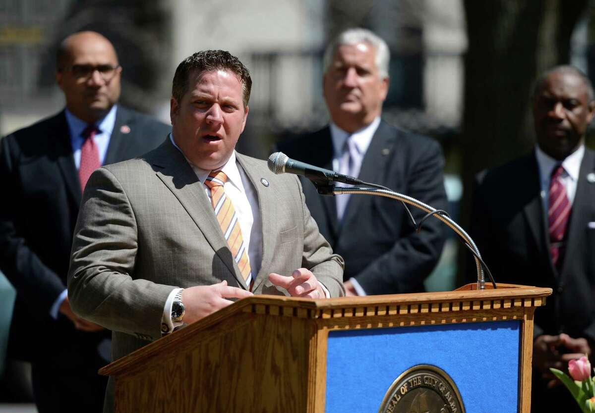 Charter panel weighs coroner's role