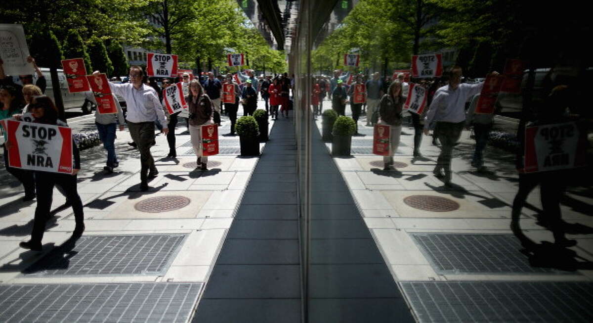 Protesters target NRA lobbyists