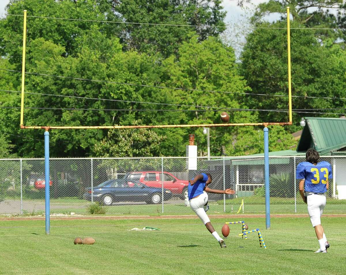 High school football spring practice begins